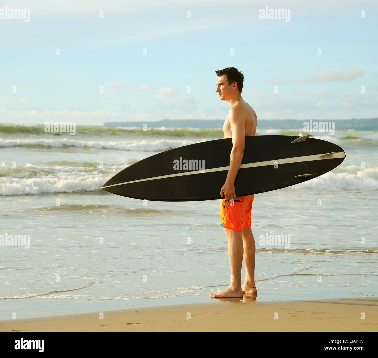 Surfer with board Stock Photo - Alamy