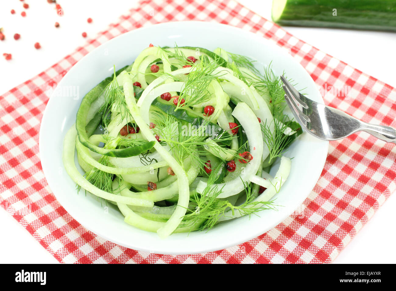 Spaghetti cucumber with red pepper and dill Stock Photo - Alamy