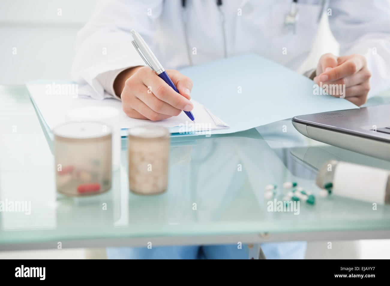 Writing prescriptions hi-res stock photography and images - Alamy