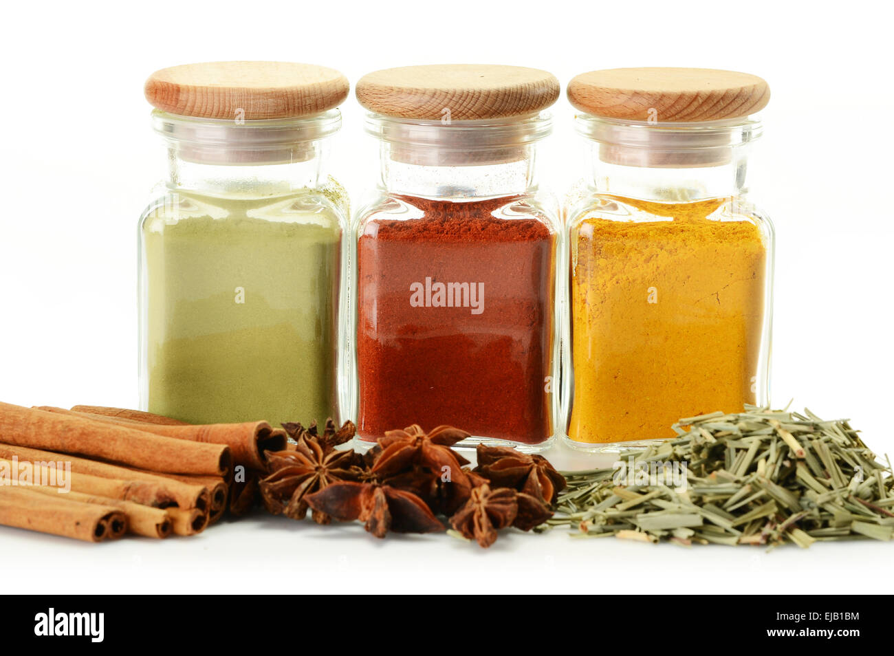Variety of spices on kitchen table Stock Photo - Alamy