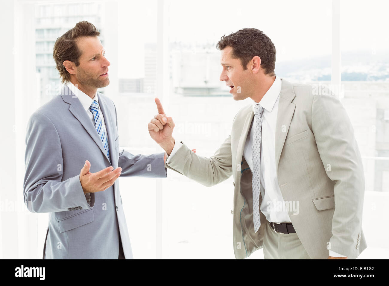 Business colleagues arguing in hi-res stock photography and images - Alamy