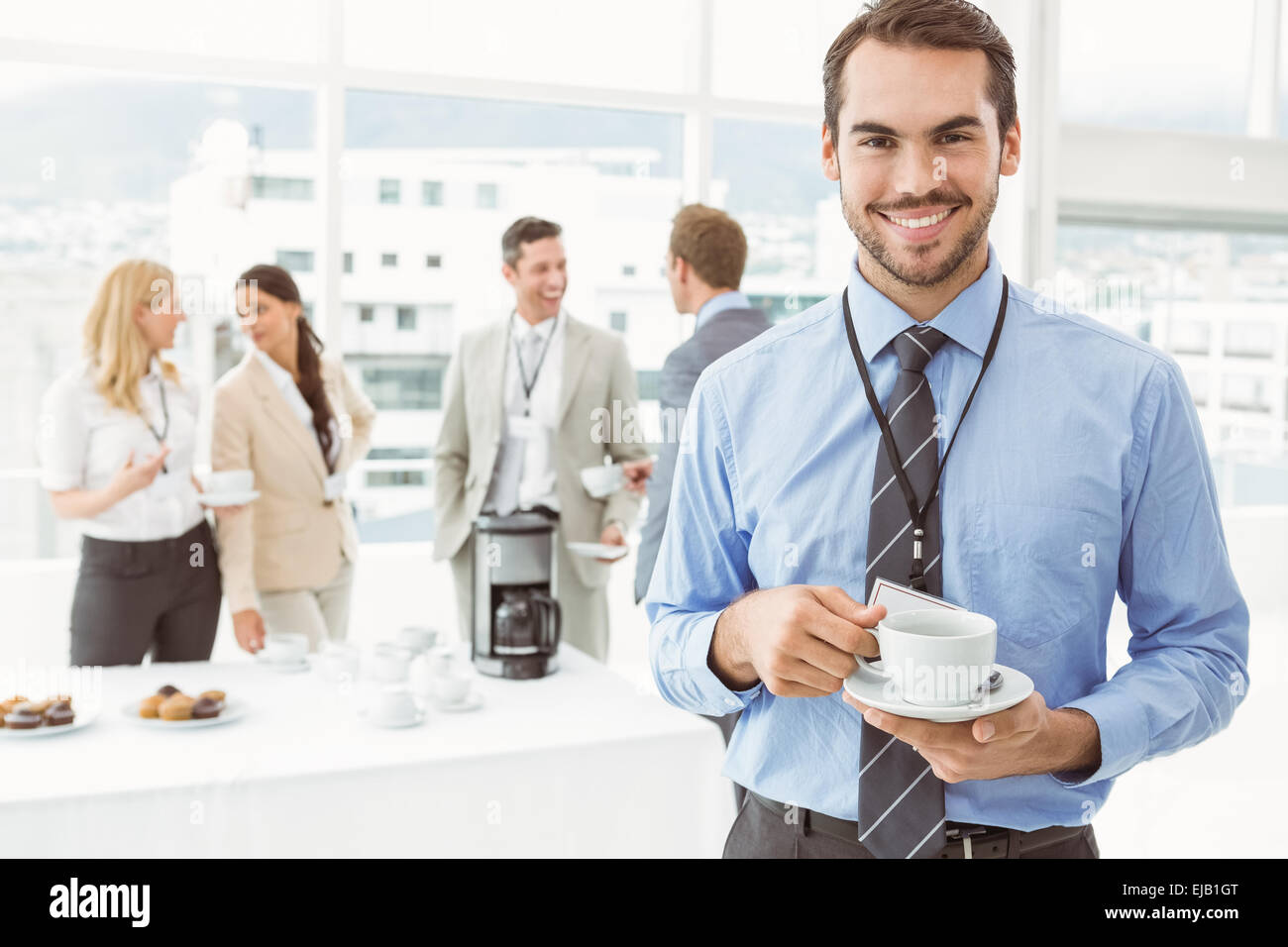 Work team during break time Stock Photo - Alamy