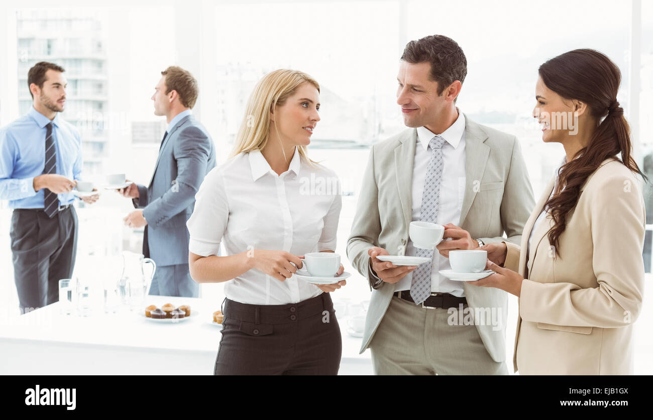 Work team during break time in office Stock Photo - Alamy