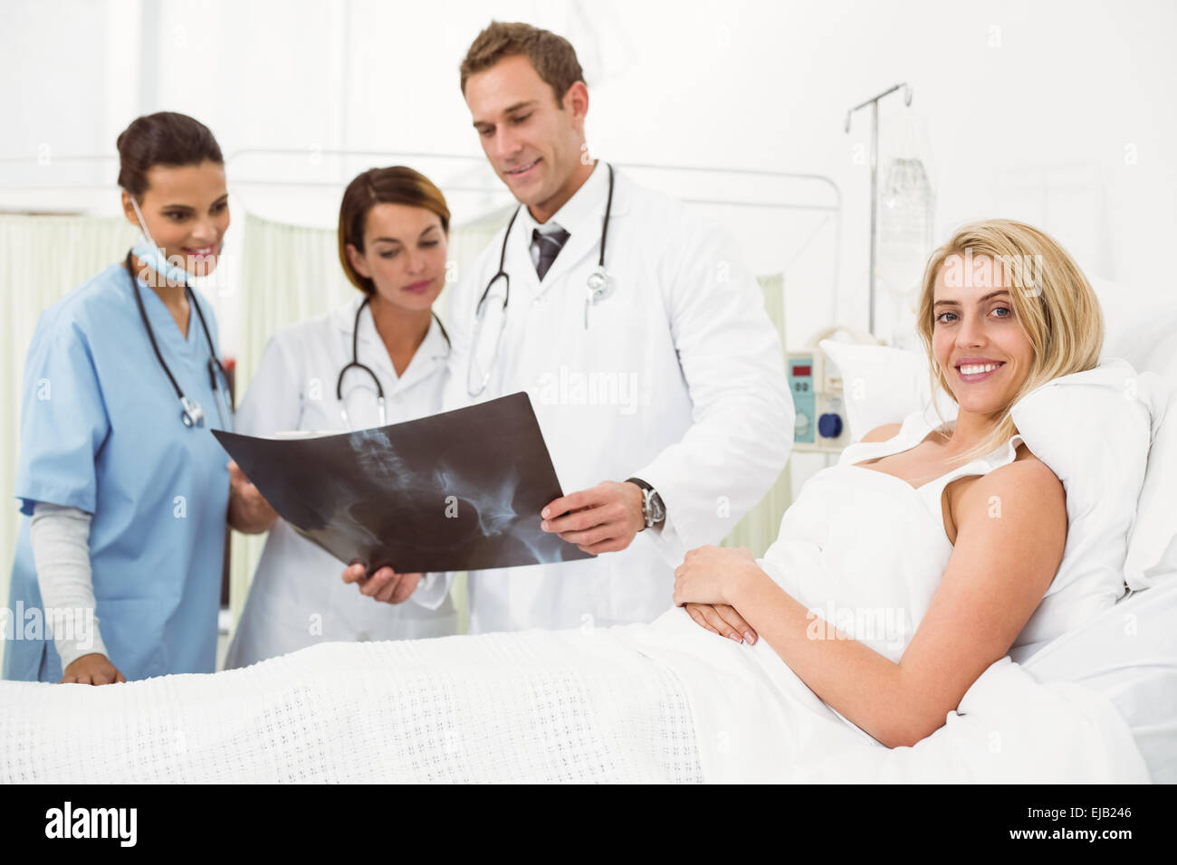 Portrait of doctors and patient with x-ray Stock Photo - Alamy