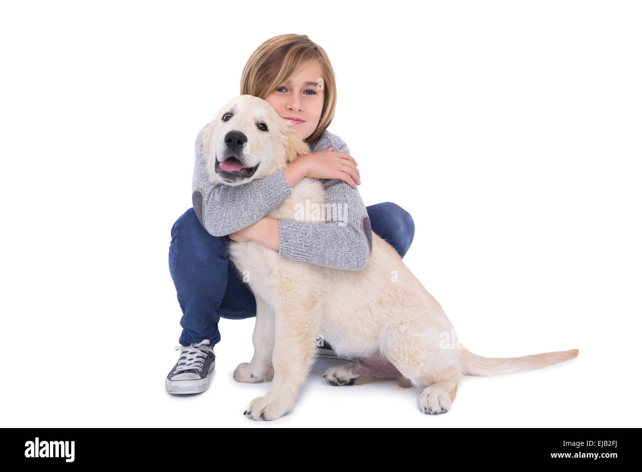 Portrait of cute boy hugging his dog Stock Photo - Alamy