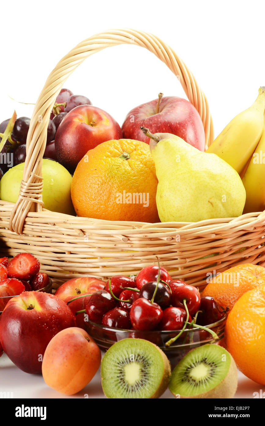 Fruits and wicker basket Stock Photo - Alamy