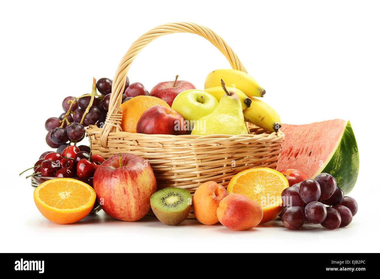 Fruits and wicker basket Stock Photo - Alamy