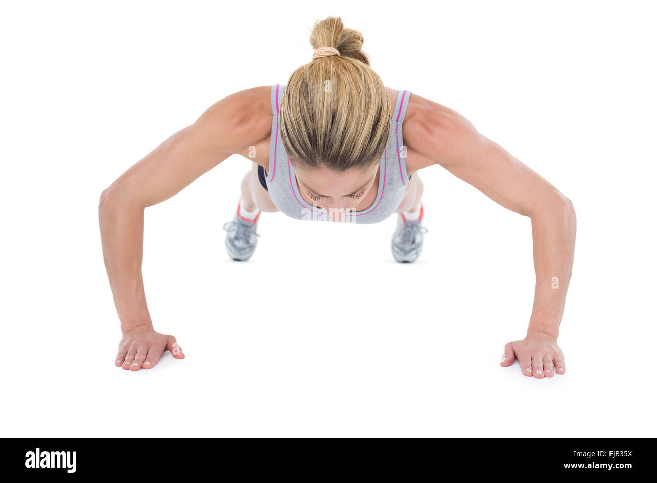 Strong woman doing press ups Stock Photo - Alamy