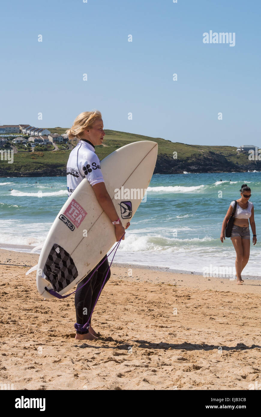 Pro Female Surfer Watches the waves at Newquays Boardmasters ...