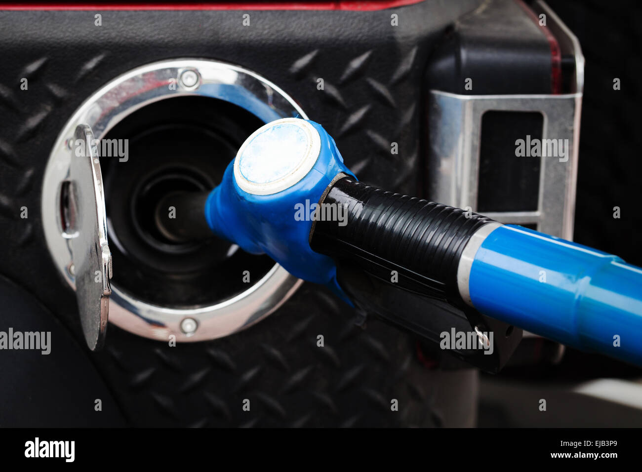 Buying petrol on gas station close up Stock Photo - Alamy
