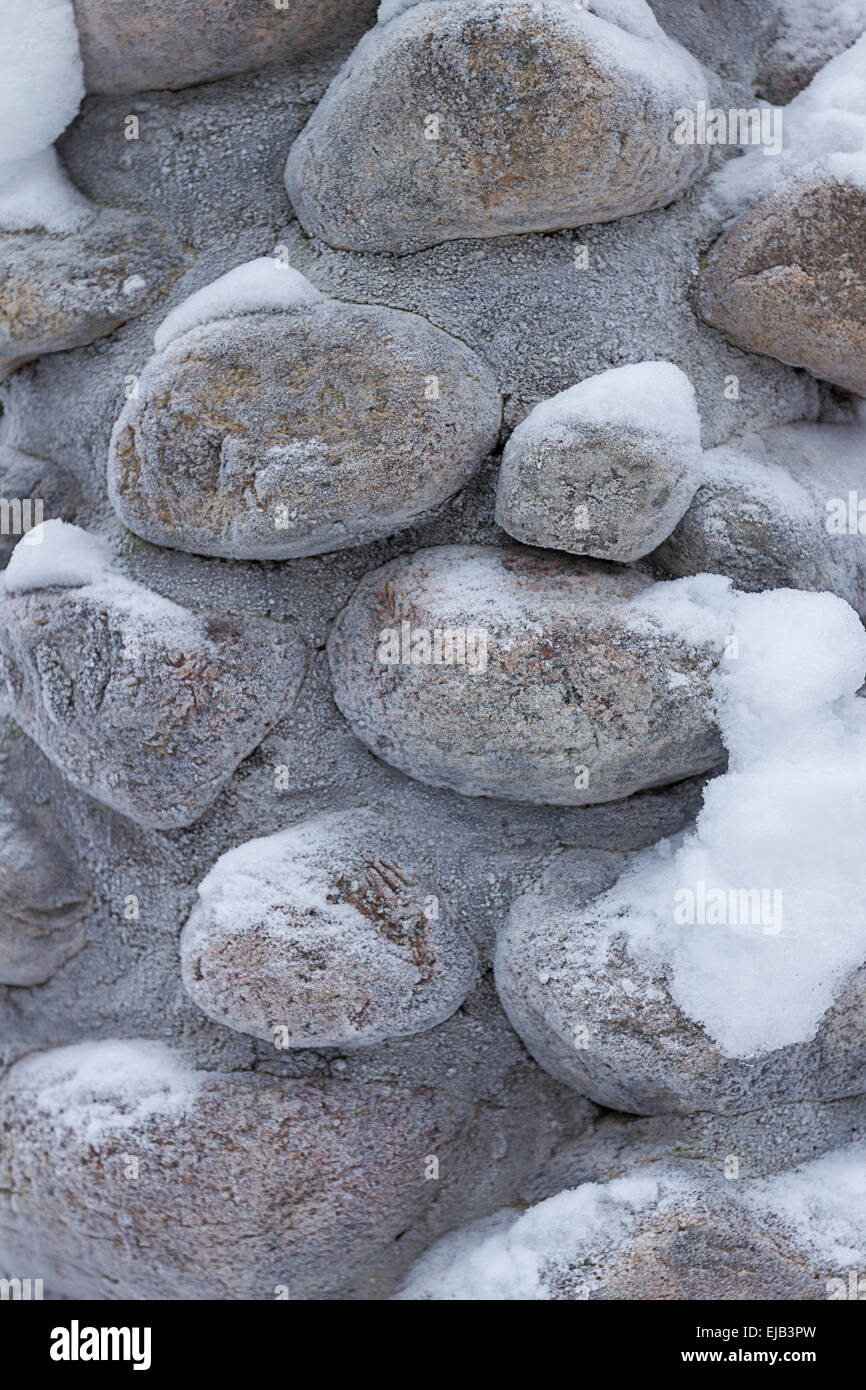 Snowy stone background in russian winter close Stock Photo - Alamy