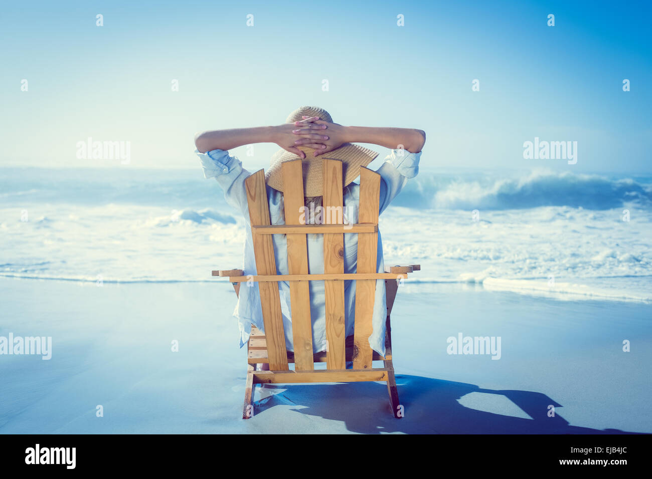 Woman relaxing in deck chair hi-res stock photography and images - Alamy