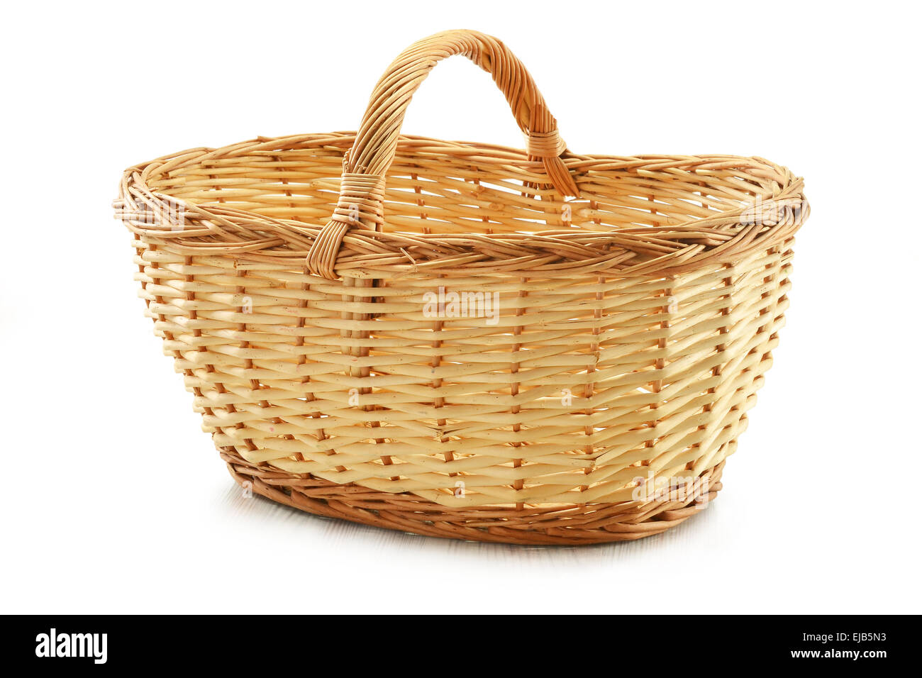 Empty wicker basket isolated on white Stock Photo - Alamy