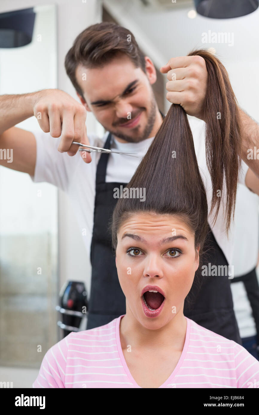 Woman getting her hair cut hi-res stock photography and images - Alamy