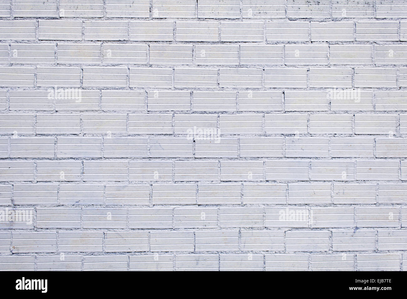 Wall white brickwork on the facade of a building, construction and ...