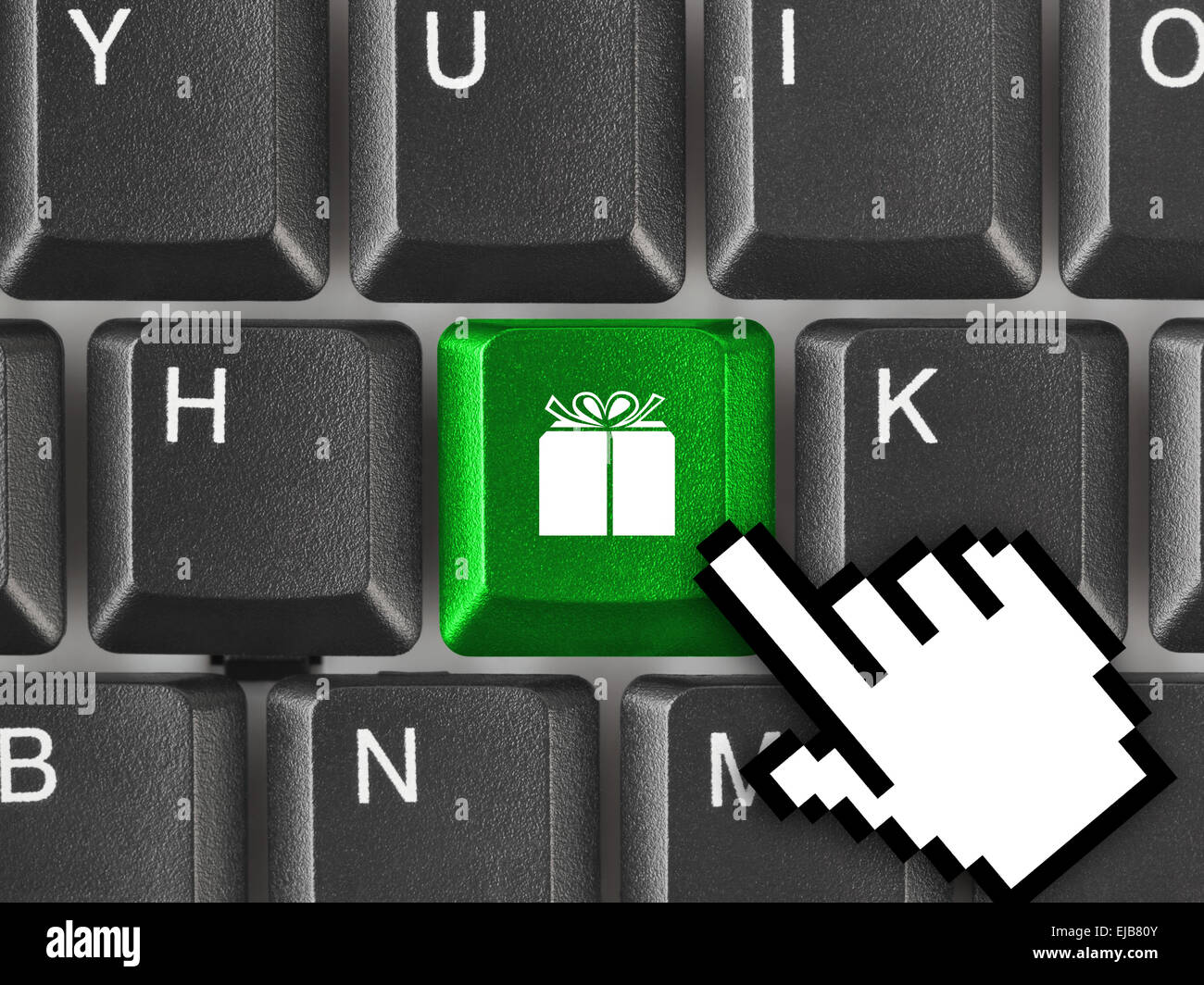Computer keyboard with gift key Stock Photo - Alamy