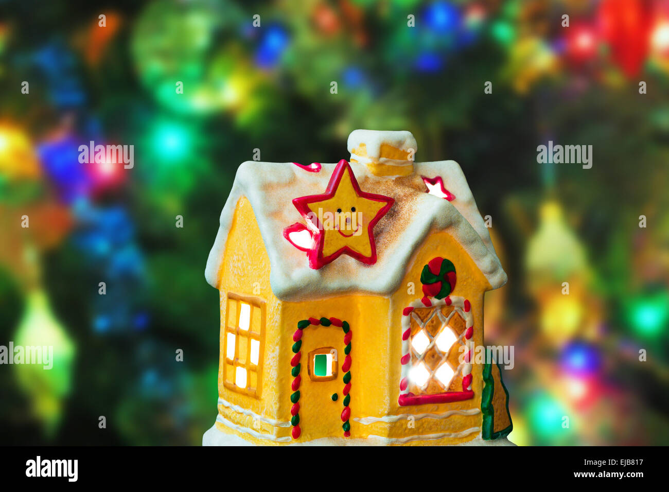 Lighting house and christmas tree Stock Photo - Alamy