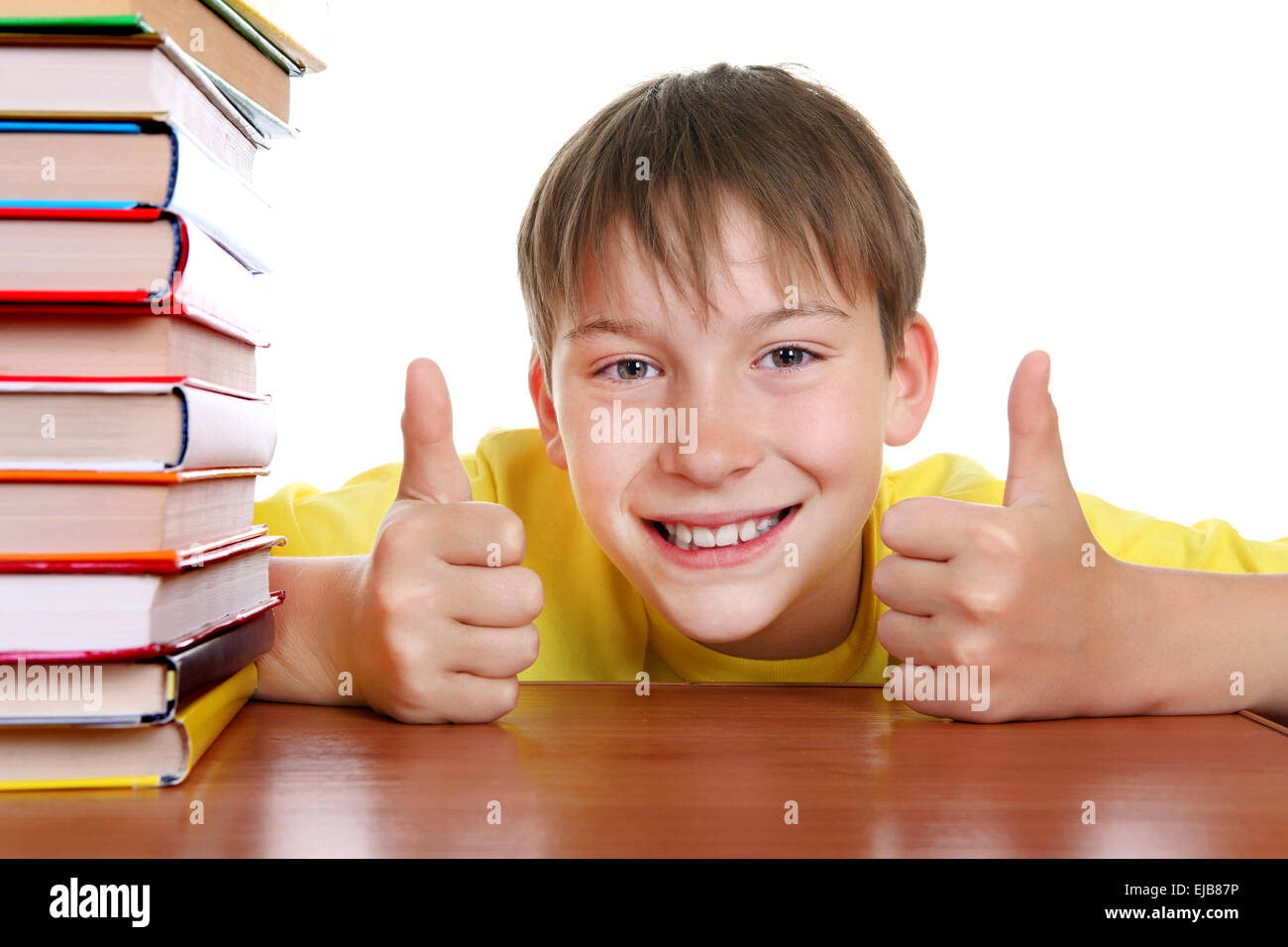 Happy Kid with a Books Stock Photo - Alamy