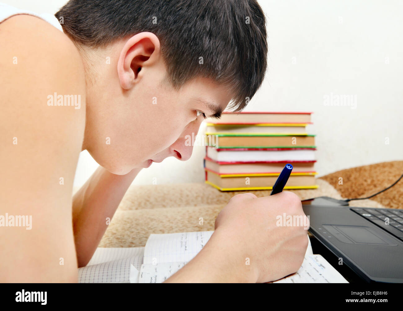 Teenager doing Homework Stock Photo - Alamy