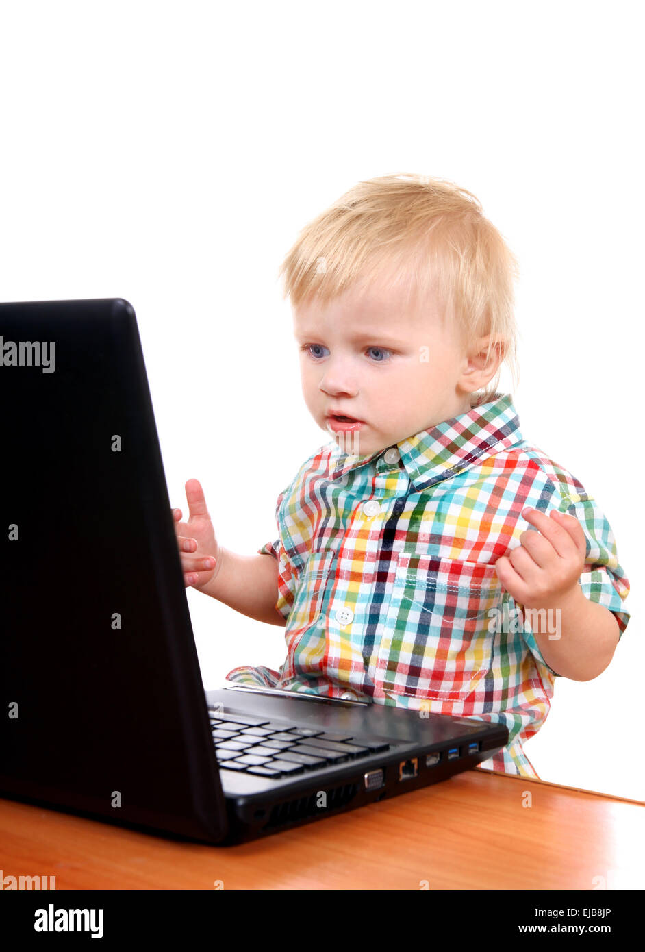 Baby Boy with Laptop Stock Photo - Alamy