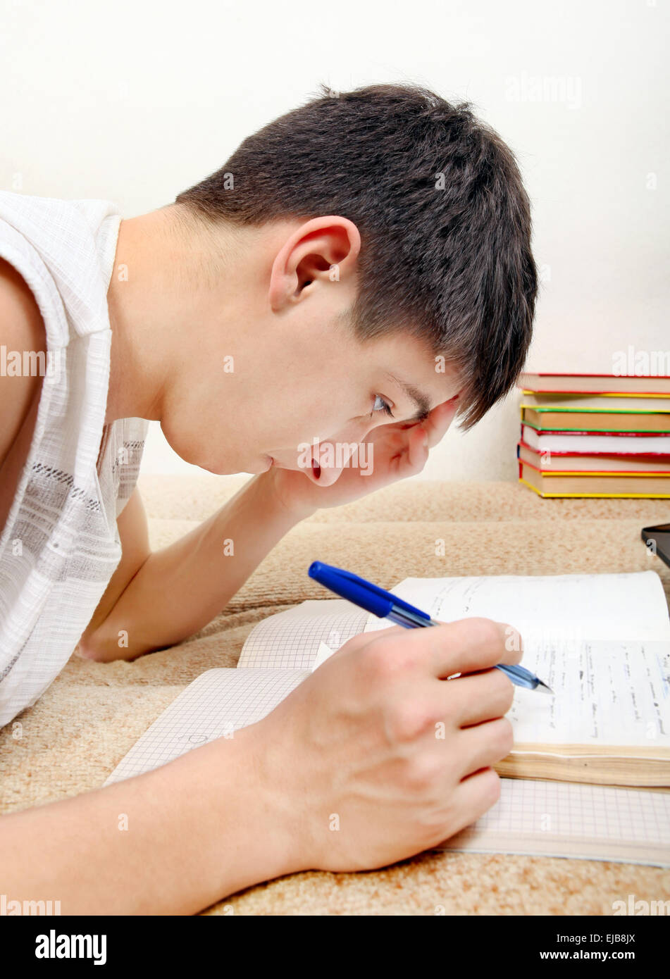 Teenager doing Homework Stock Photo - Alamy