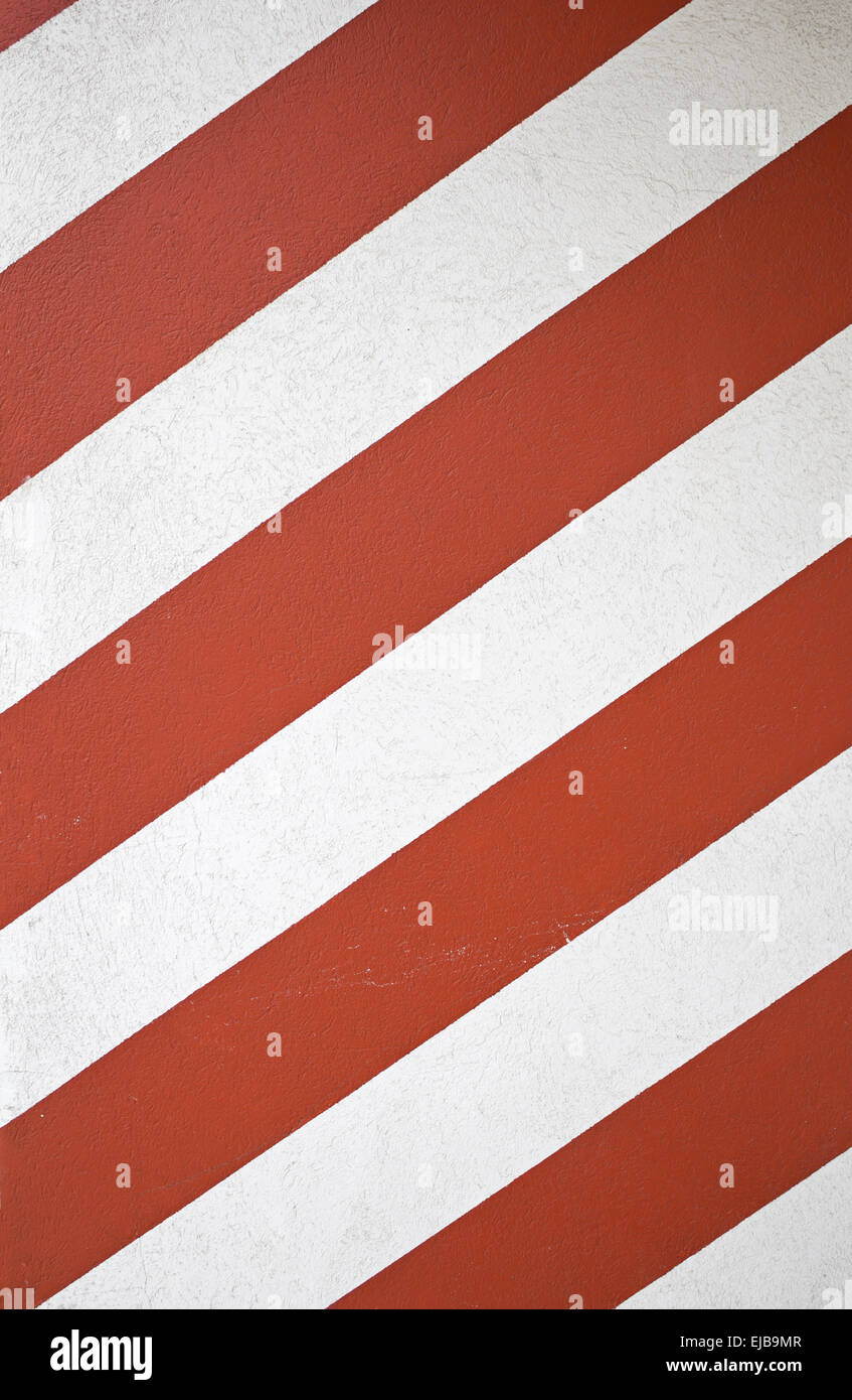 Signal with bright red and white lines diagonally, construction and ...