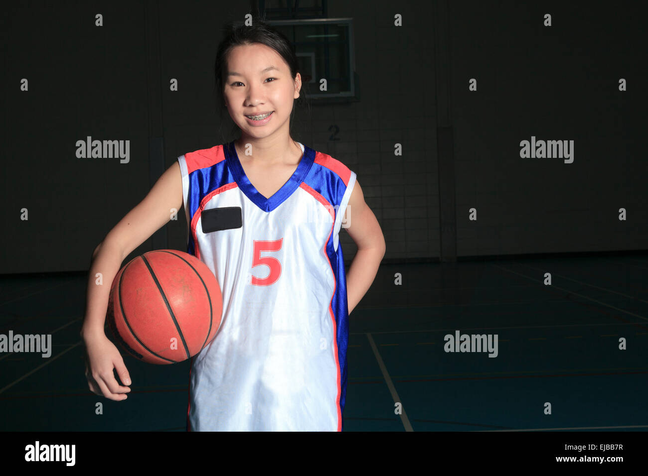 A asian basketball player in gymnase field Stock Photo - Alamy