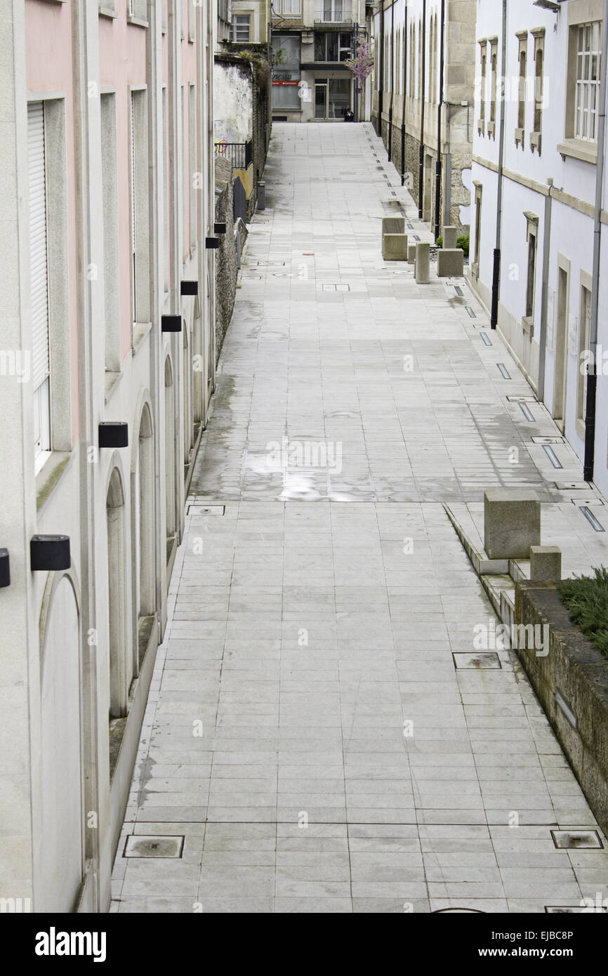 City street with tiles and building in an alley, building and ...