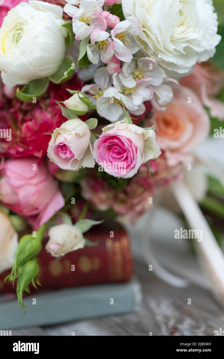 Spring bouquet of pink roses, ranunculus and apple blossoms of the ...