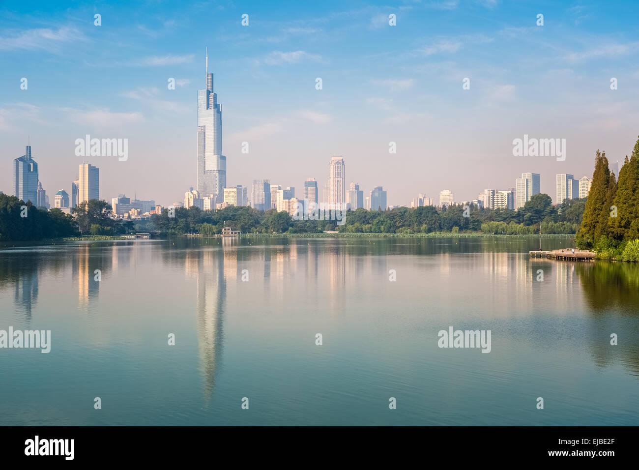 modern city building reflected in the lake Stock Photo - Alamy