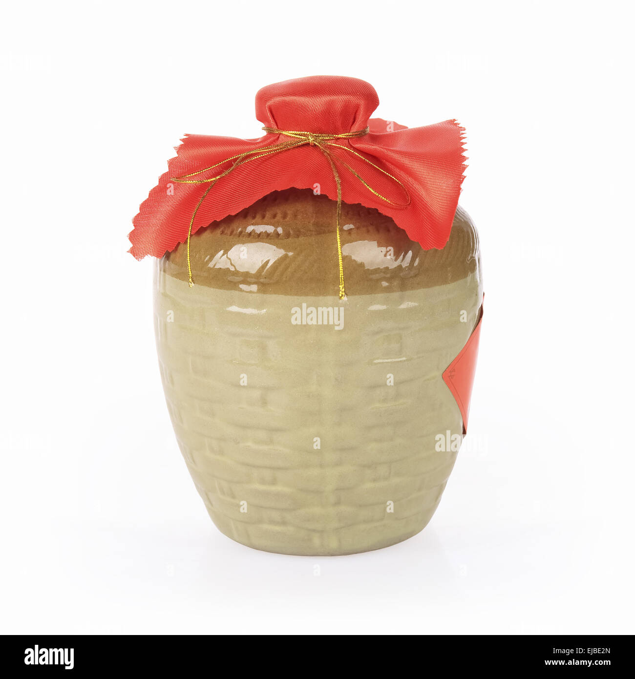 yellow rice wine jar on a white background Stock Photo - Alamy
