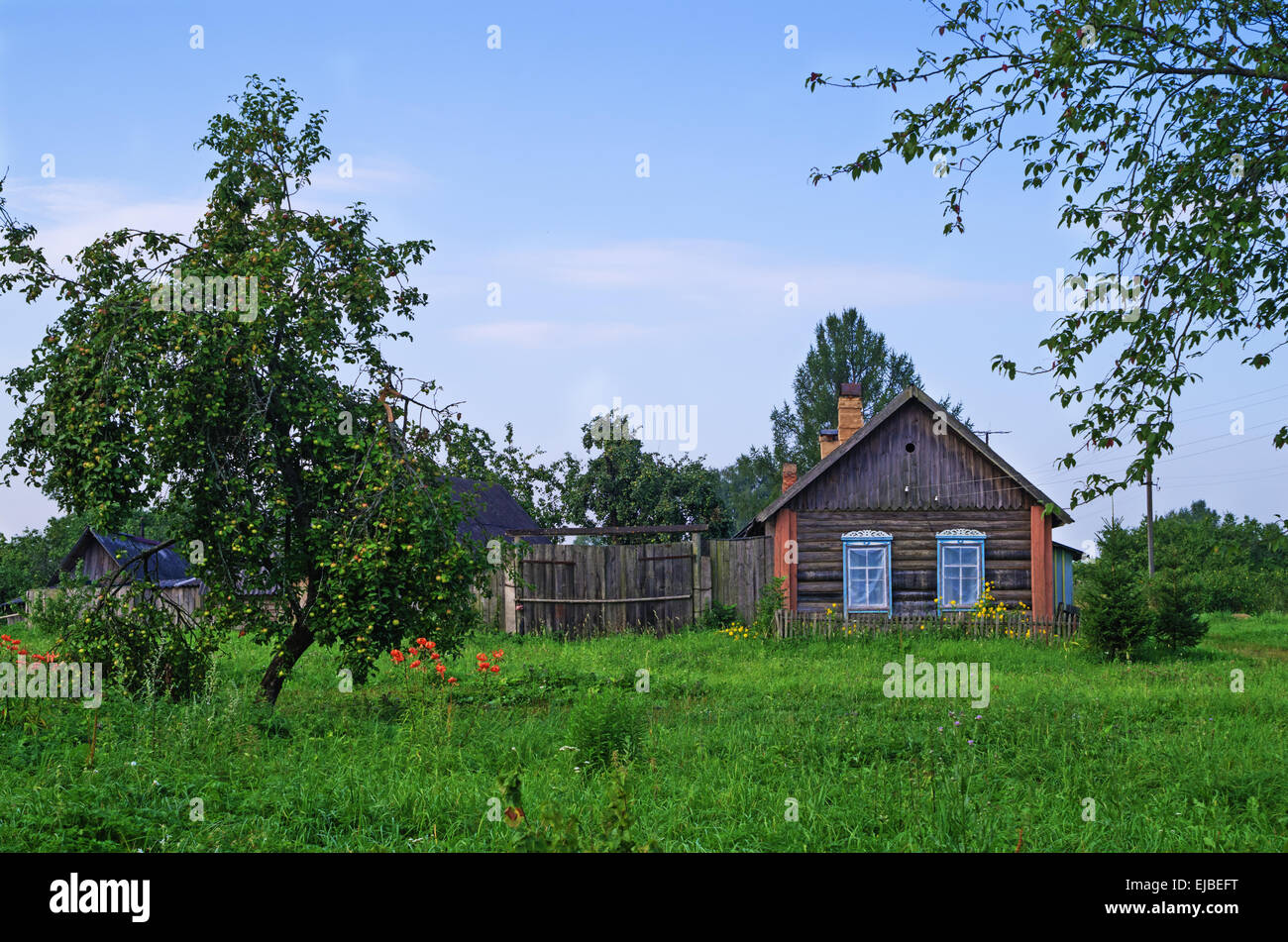 Rural landscape with wooden house Stock Photo - Alamy