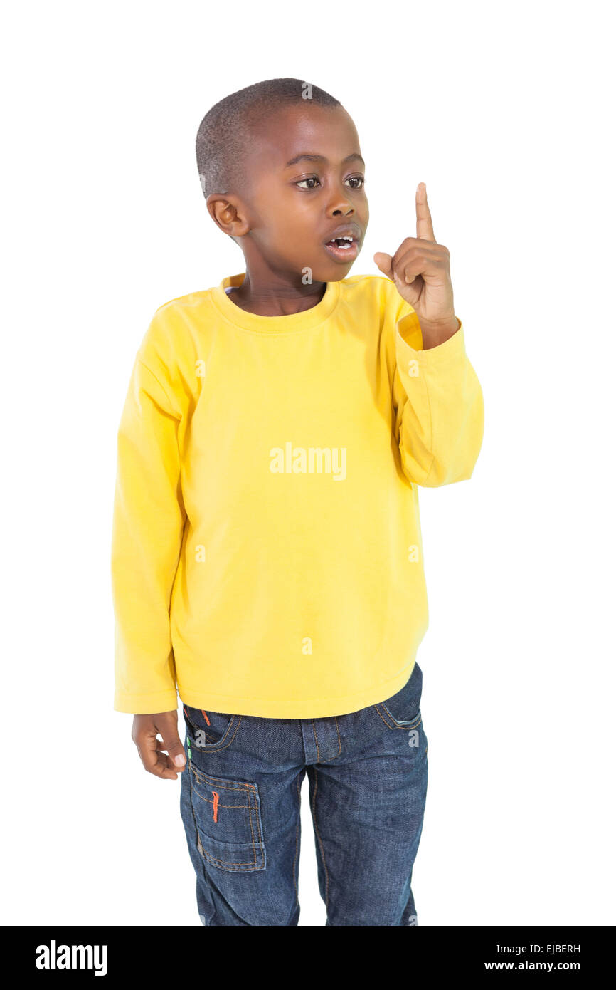 Happy little boy pointing up Stock Photo - Alamy