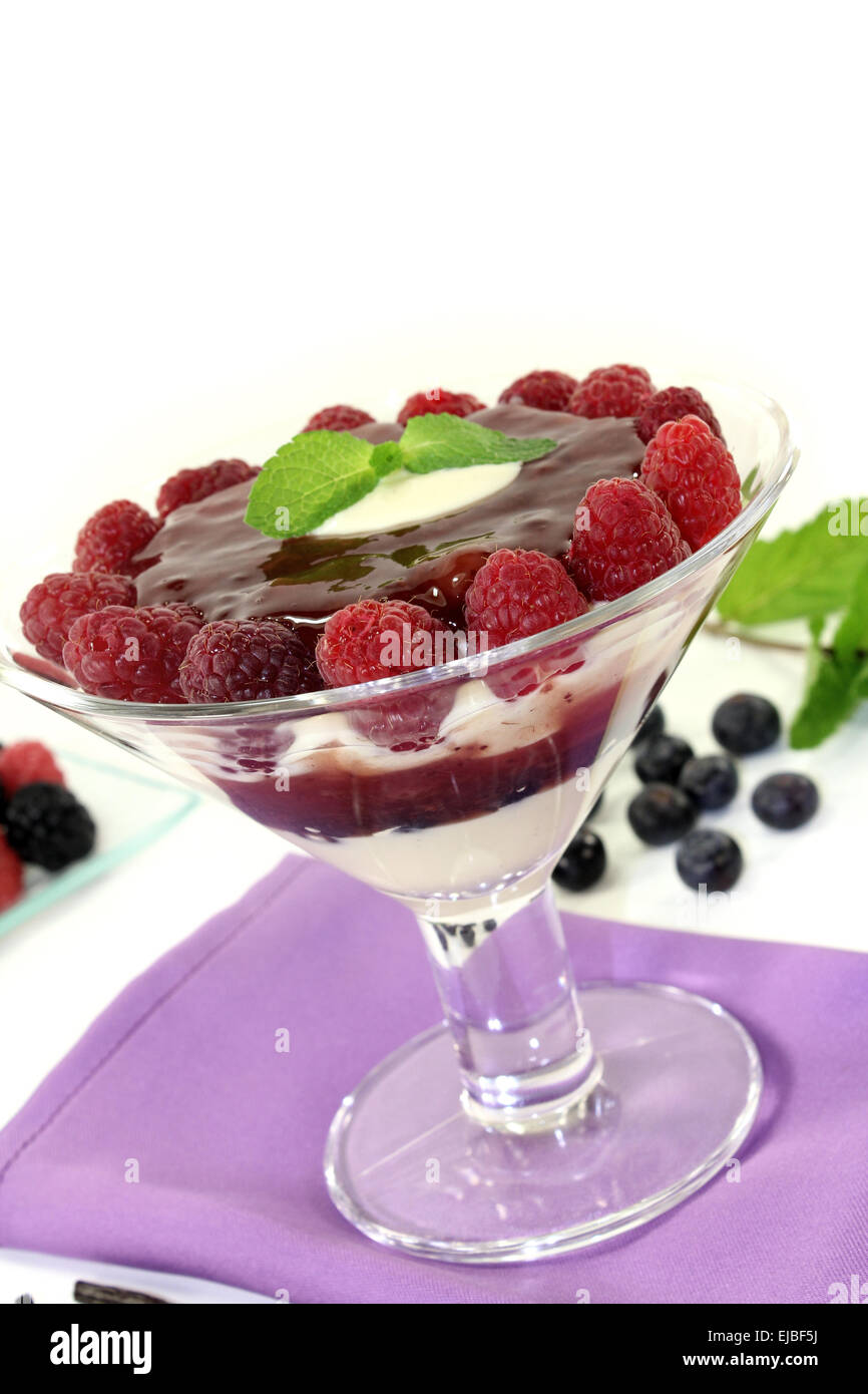 layered dessert with blueberries and raspberries Stock Photo - Alamy