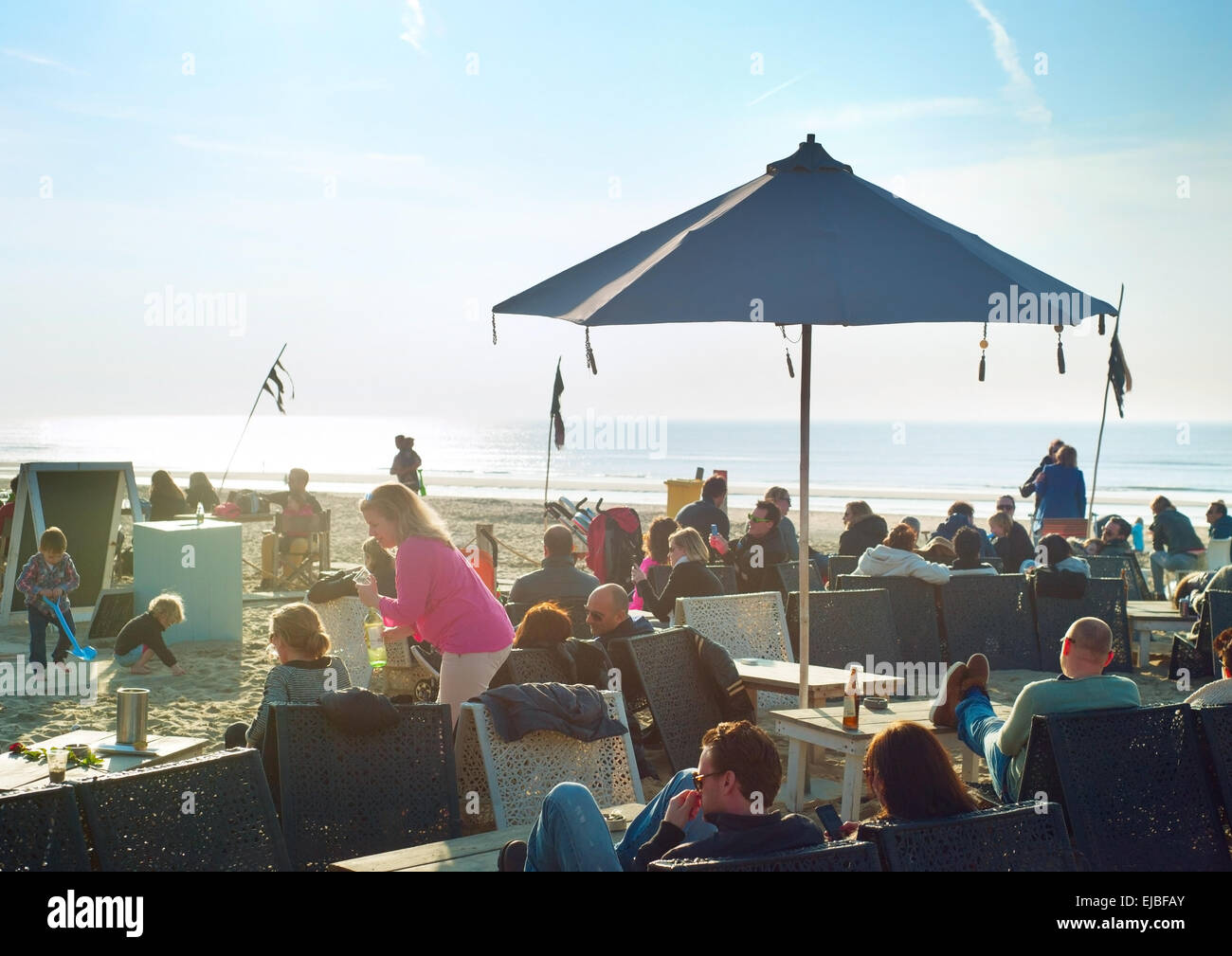 Beach restaurant sunset sea sun tables hi-res stock photography and ...