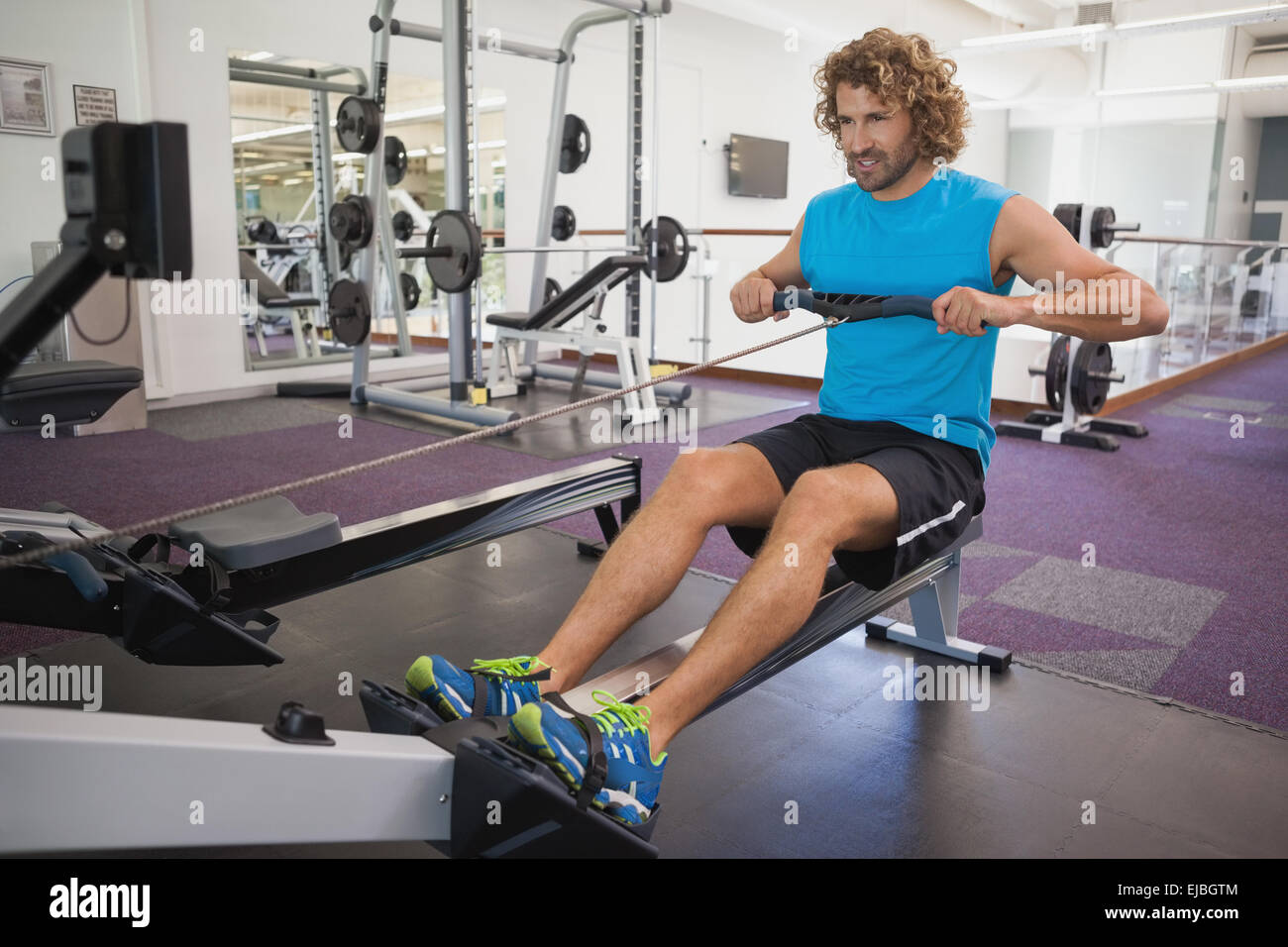 Man muscular exercise resistance band hi-res stock photography and ...