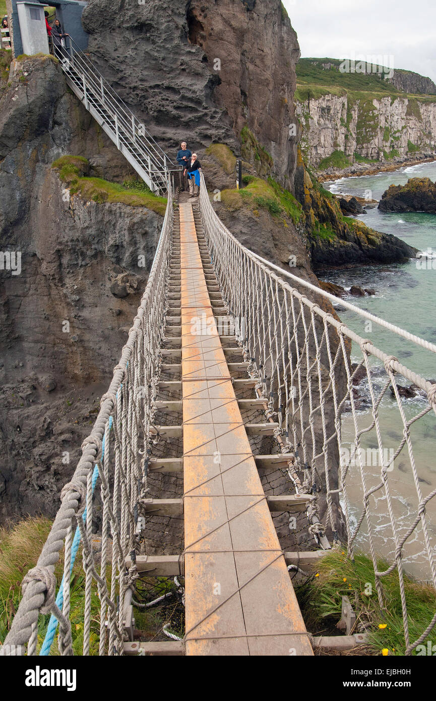 Visitors prepare to cross the Carrick-a-Rede Rope Bridge in County ...