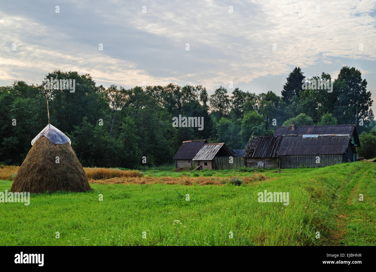 Haystack in village Stock Photo - Alamy