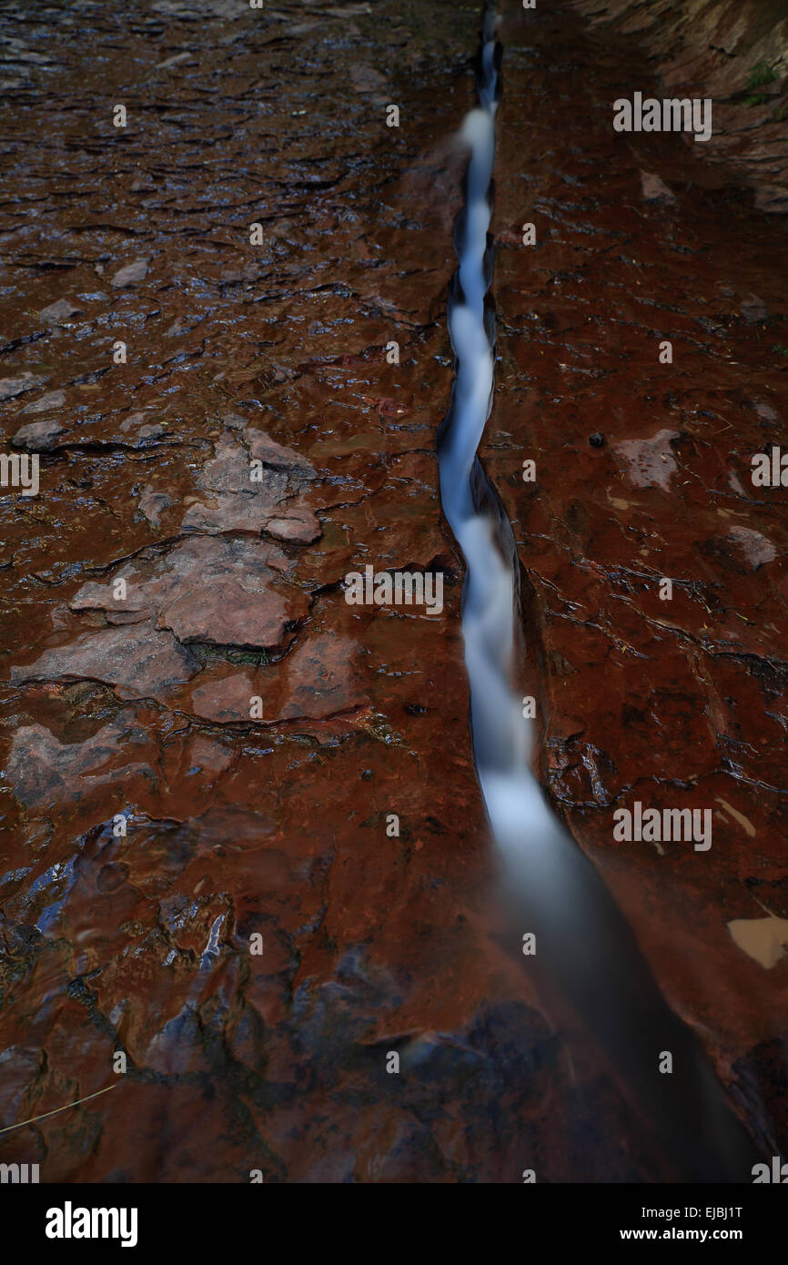 Water Flowing through Crack in Zion National Park Stock Photo - Alamy