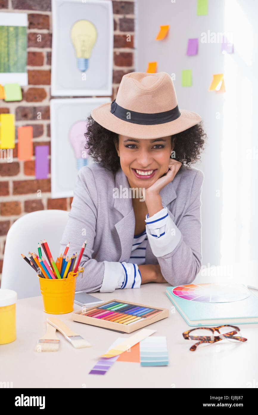 Portrait of female interior designer at desk Stock Photo - Alamy