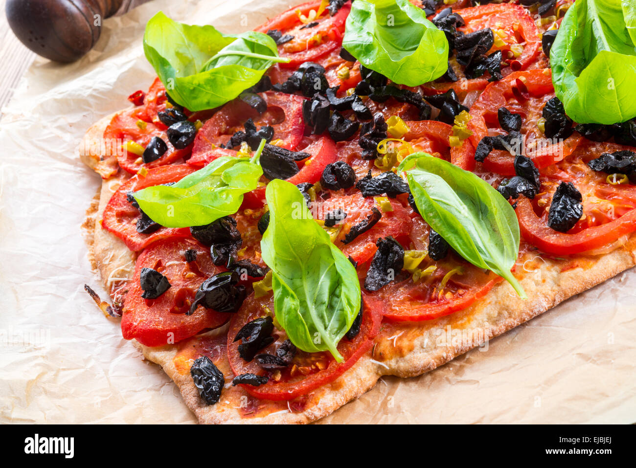 homemade olive - tomato pizza Stock Photo - Alamy