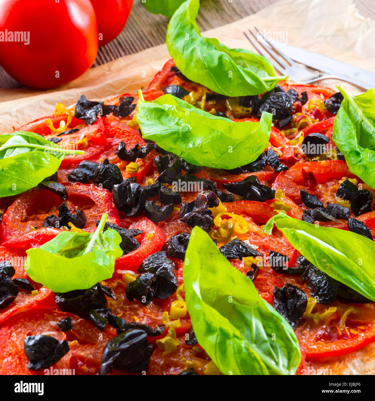 homemade olive - tomato pizza Stock Photo - Alamy