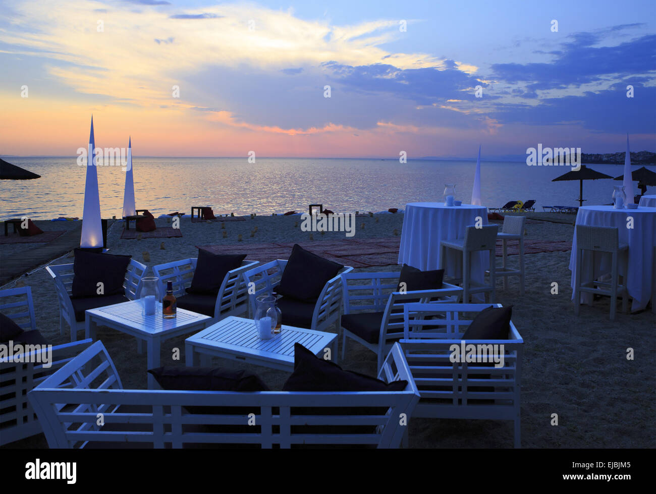 Beach party at sunset Stock Photo - Alamy