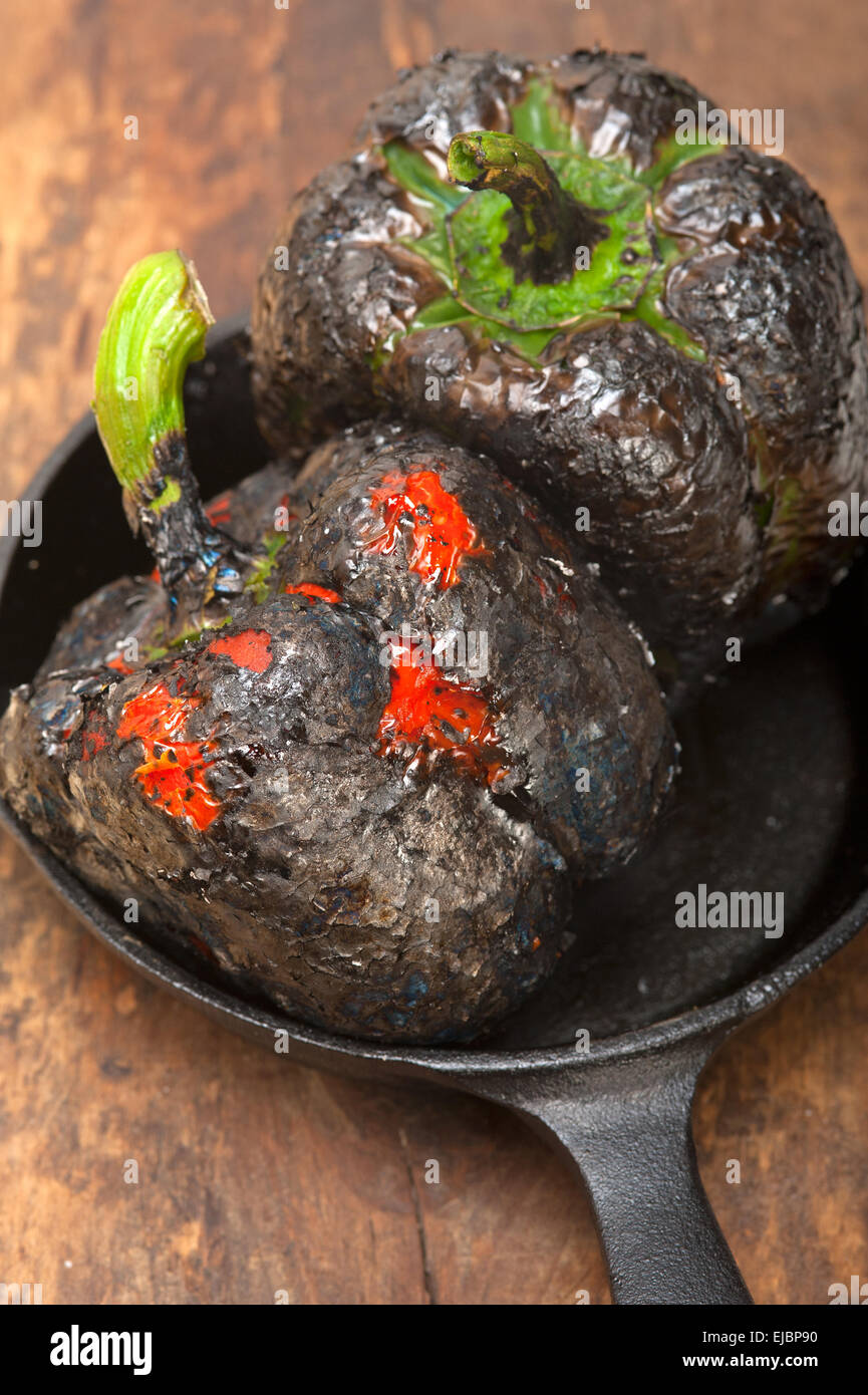 charcol scorched fresh bell peppers Stock Photo - Alamy