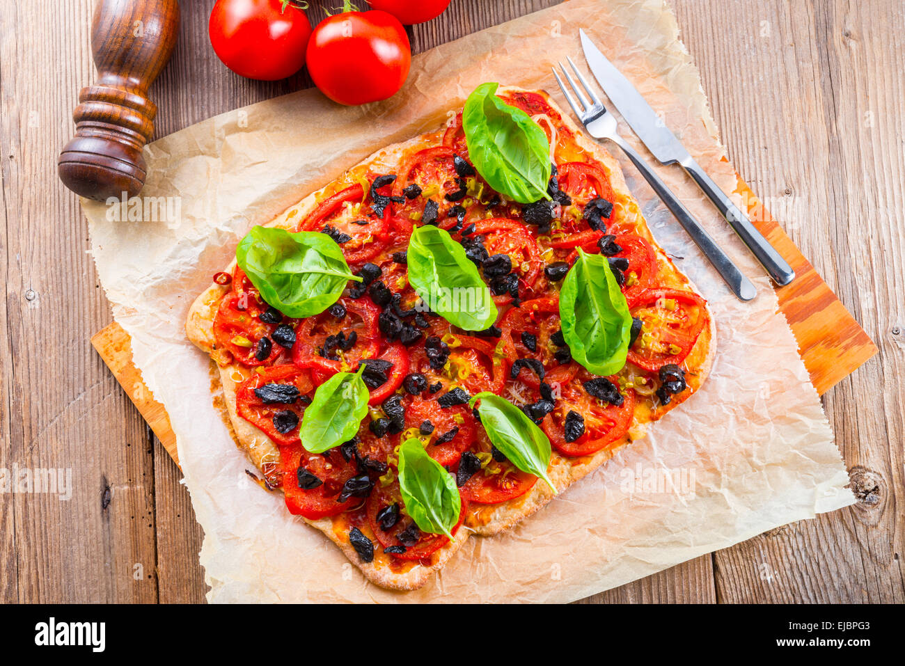 homemade olive - tomato pizza Stock Photo - Alamy