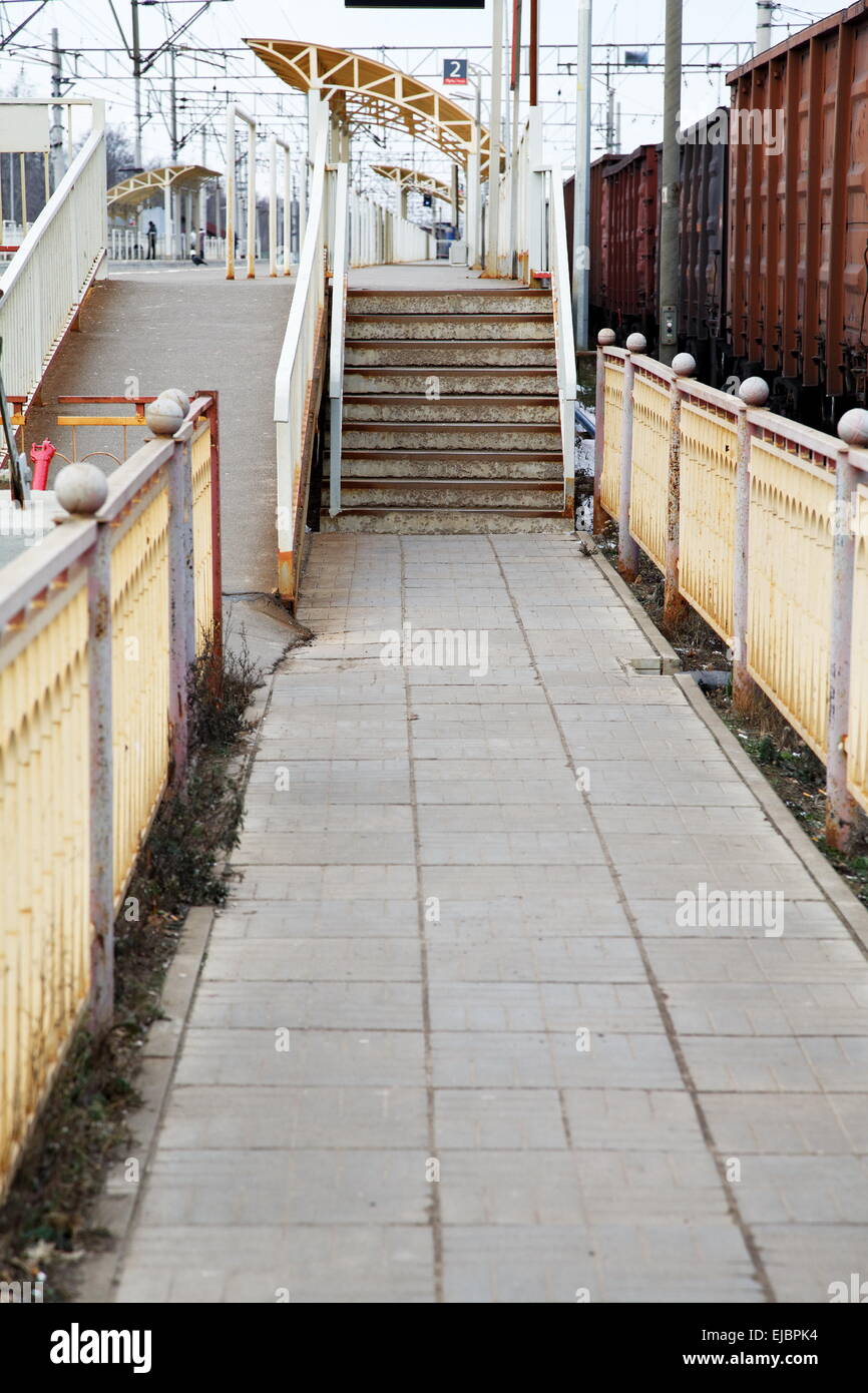 Railway platform and cars at station Stock Photo - Alamy