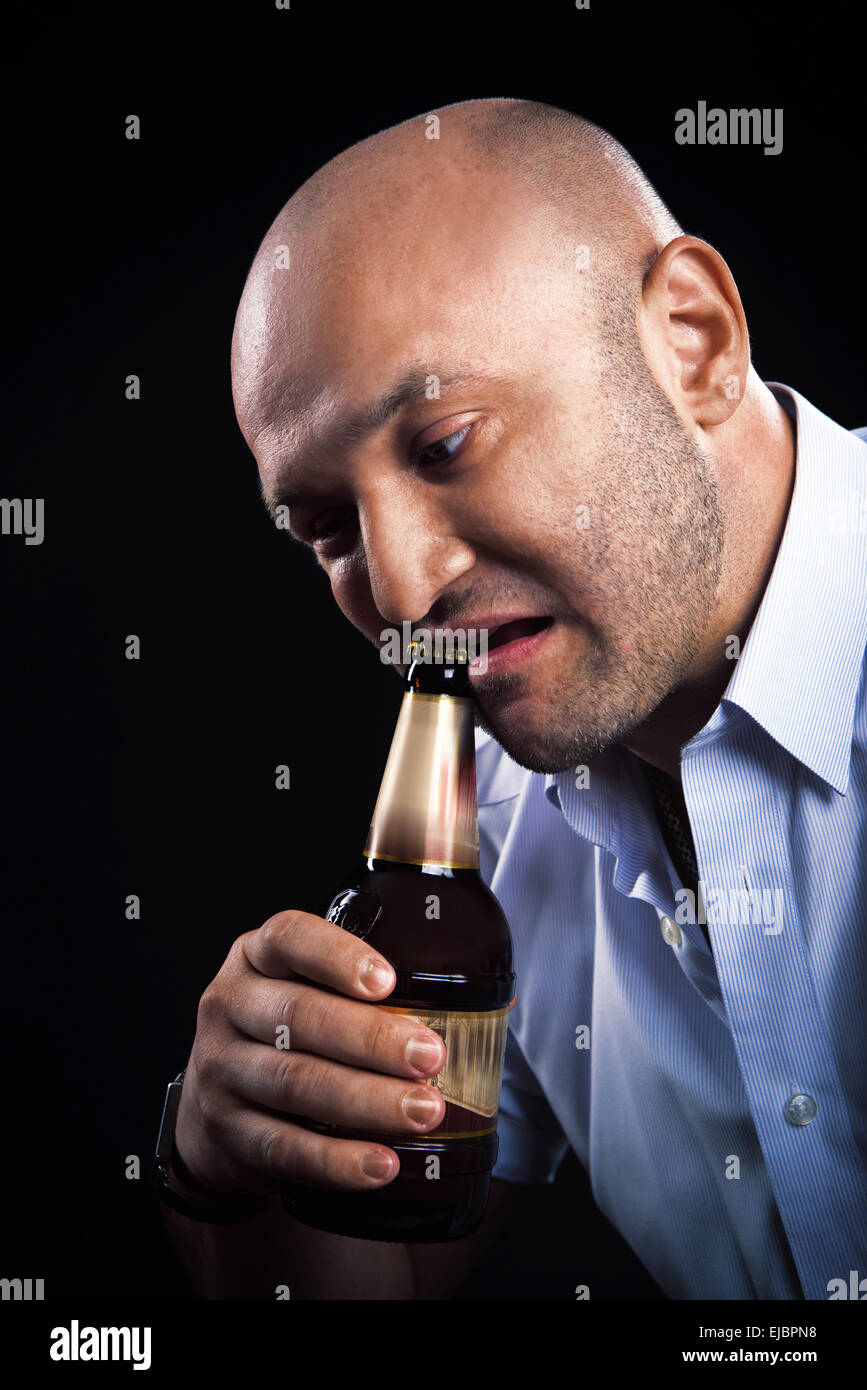 man emotionally open beer teeth Stock Photo - Alamy