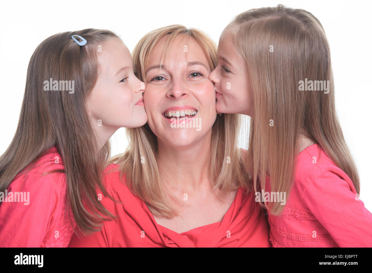 A mother with is two daughter Stock Photo - Alamy