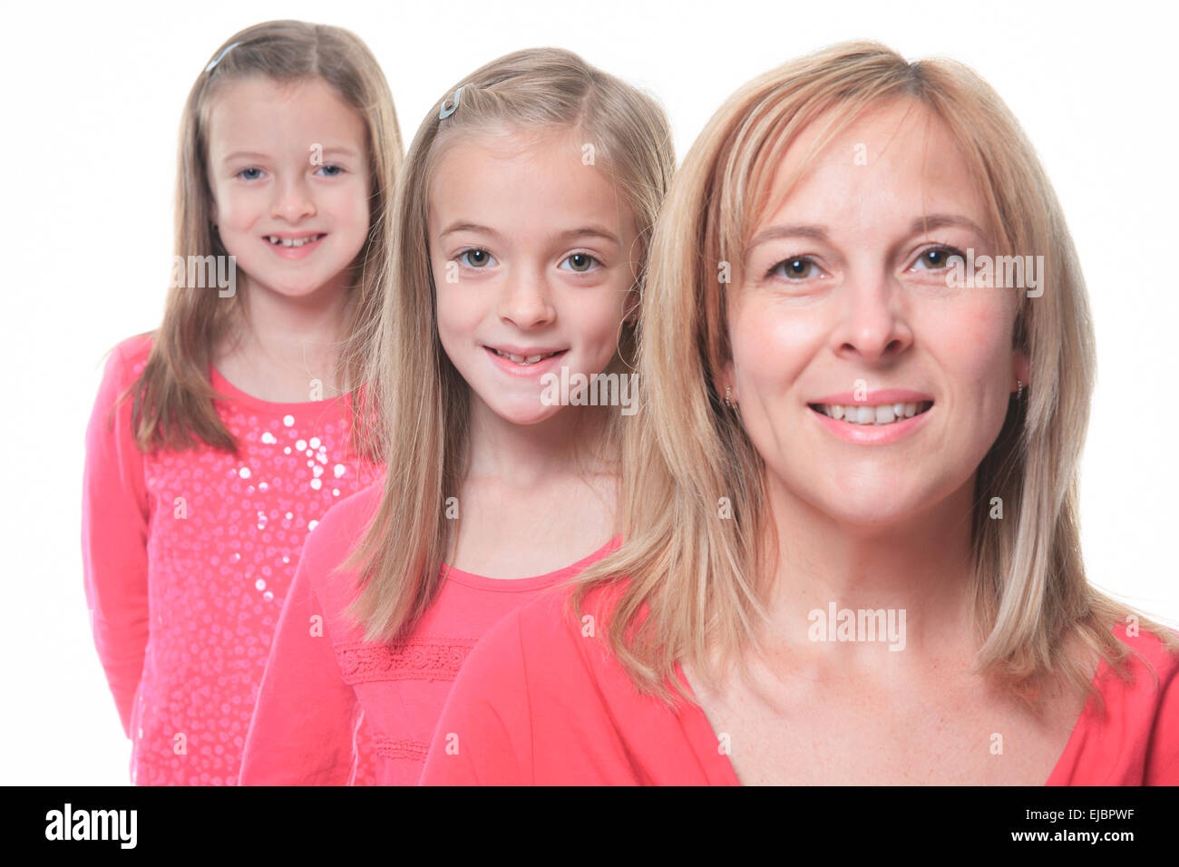 A mother with is two daughter Stock Photo - Alamy