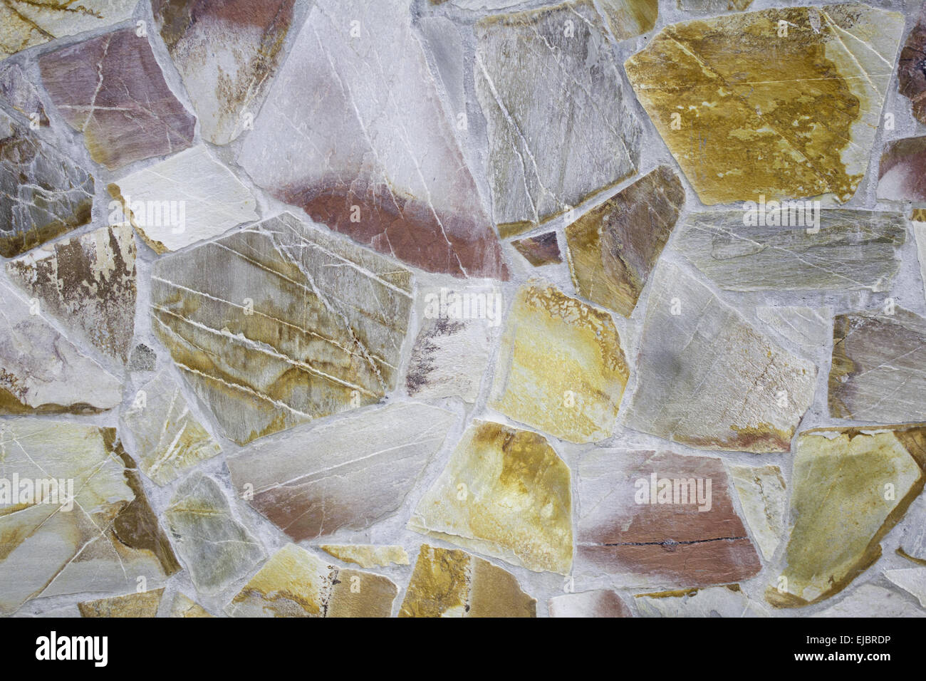 Colored tiles on the facade of a building, construction and ...